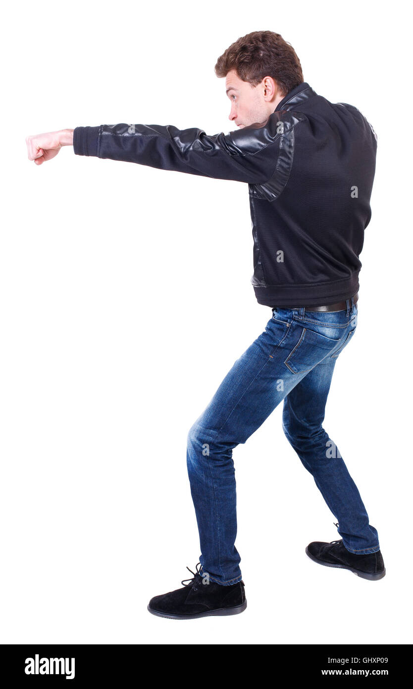 back view of guy funny fights waving his arms and legs Stock Photo - Alamy