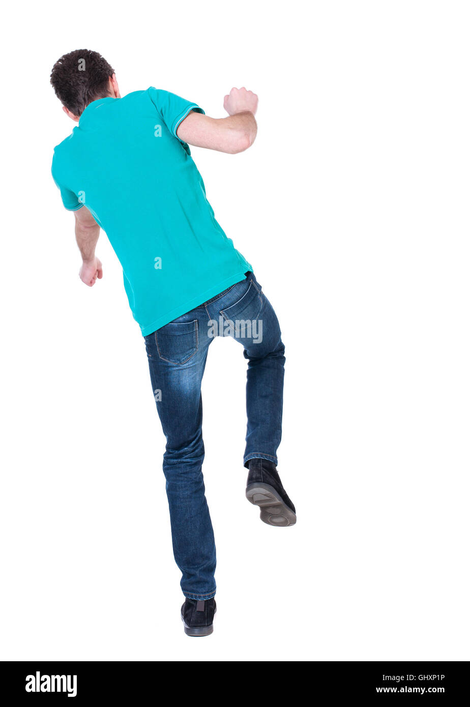 Balancing young man. or dodge the falling Stock Photo - Alamy