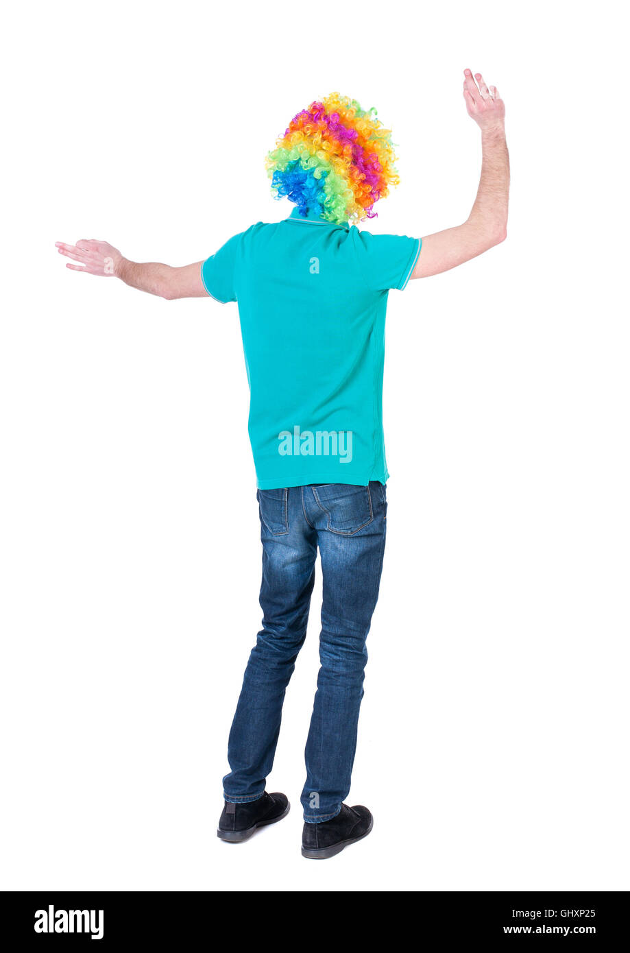 back view of dancing young beautiful man in clown wig Stock Photo - Alamy