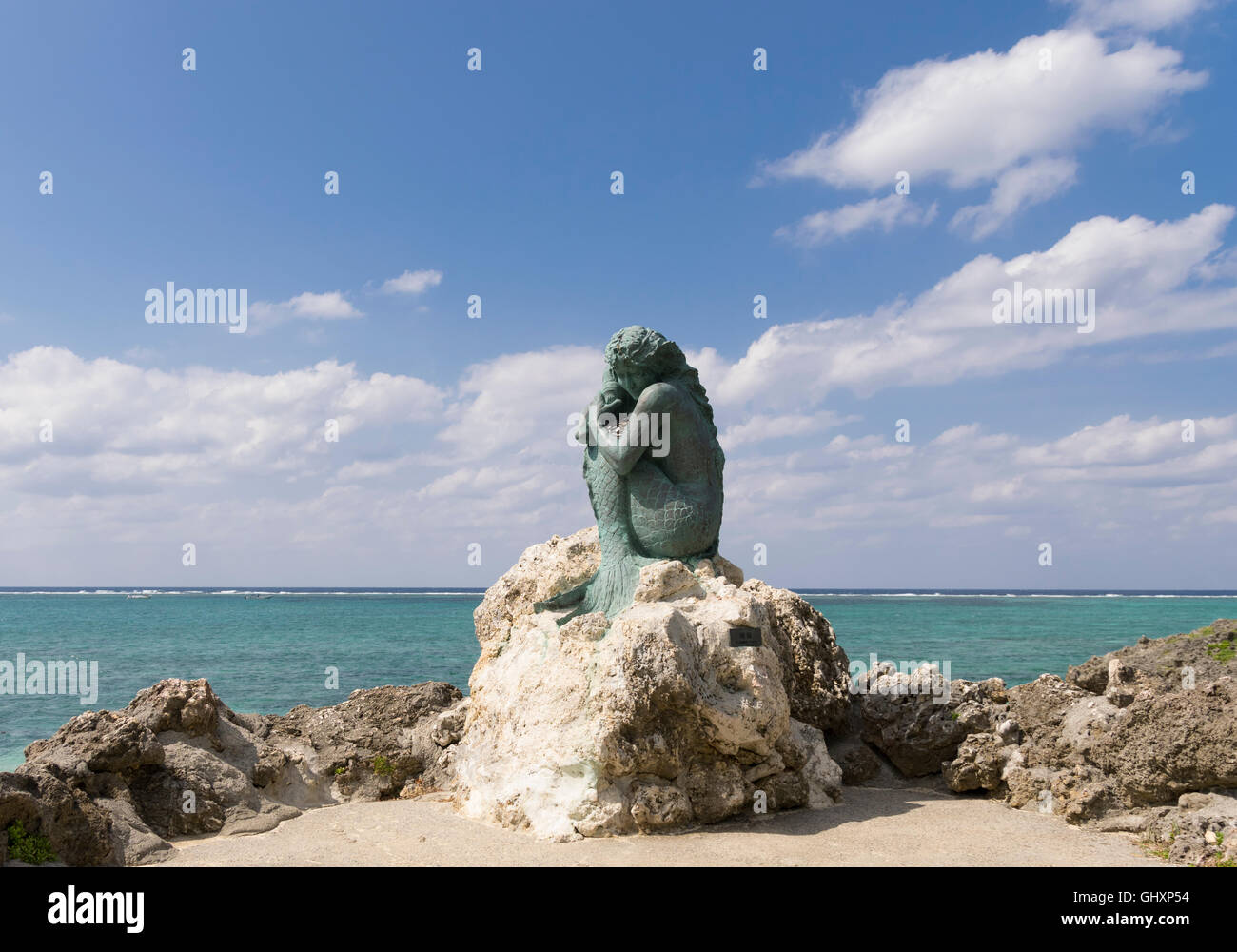 Mermaid Bronze statue by Naka Bokunen, Moon Beach, Okinawa, Japan Stock ...