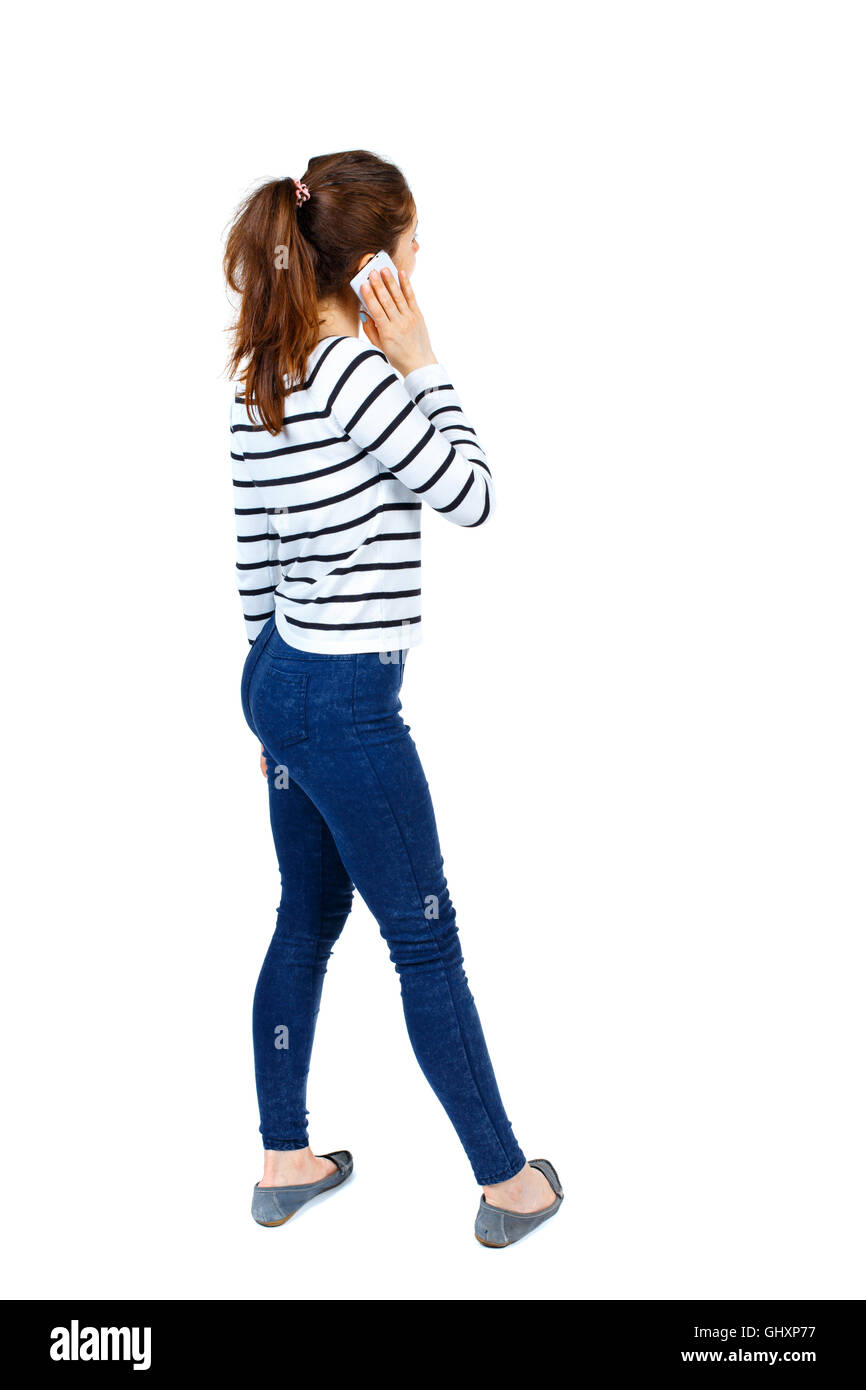 back view of a woman talking on the phone Stock Photo - Alamy
