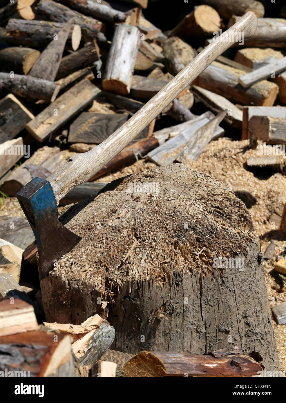 big ax of the woodcutter on the block of wood in the woodshed Stock ...