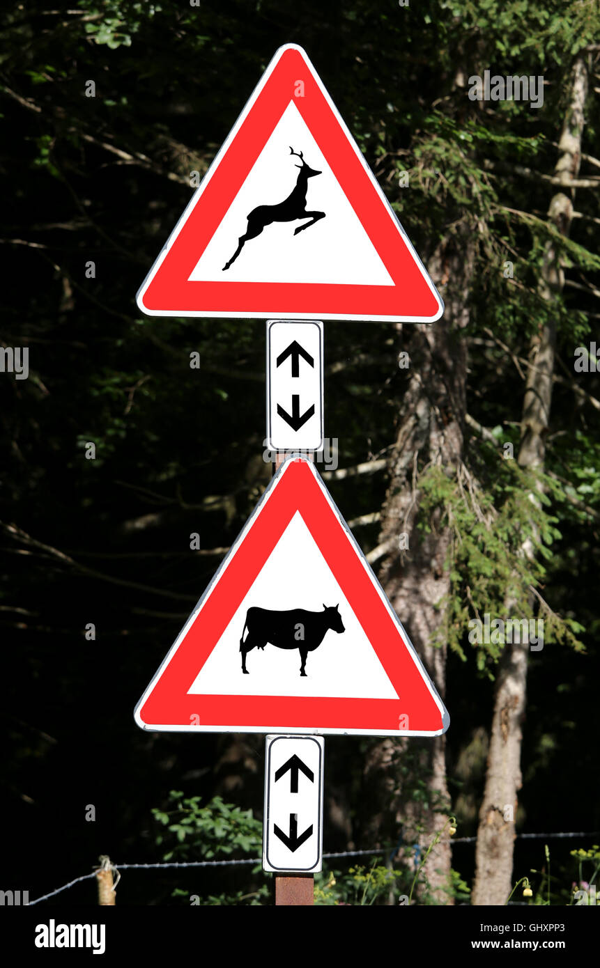 Two red triangle road signs hi-res stock photography and images - Alamy