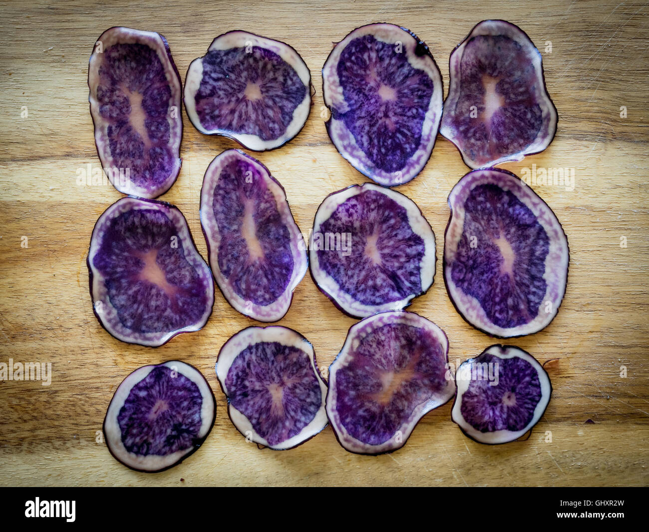 Potato chips made from blue potatoes Stock Photo - Alamy