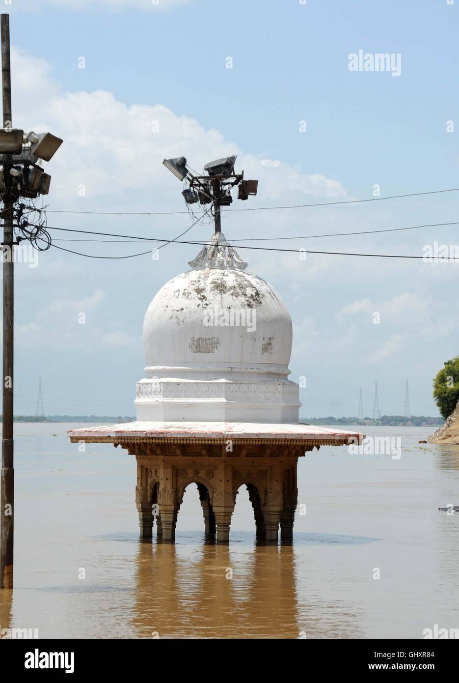 Allahabad, India. 11th Aug, 2016. A view of a temple submerged with ...