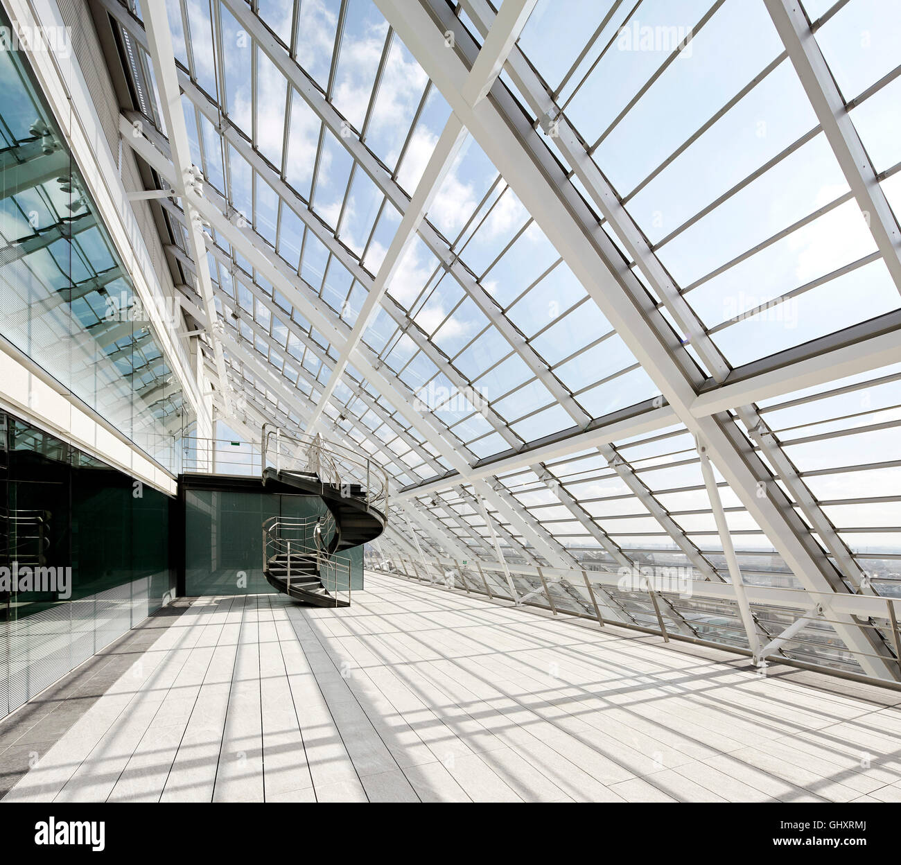 Balcony canopied by sloped roof glazing. 70 Mark Lane - City of London ...