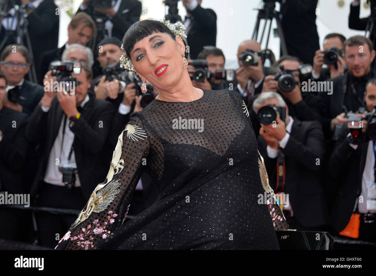 69th Cannes Film Festival: Rossy de Palma walking up the famous steps ...