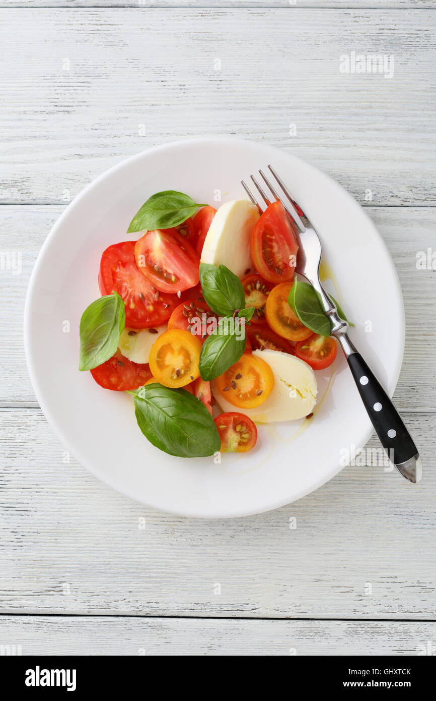 Italian caprese salad on plate. Food top view Stock Photo - Alamy