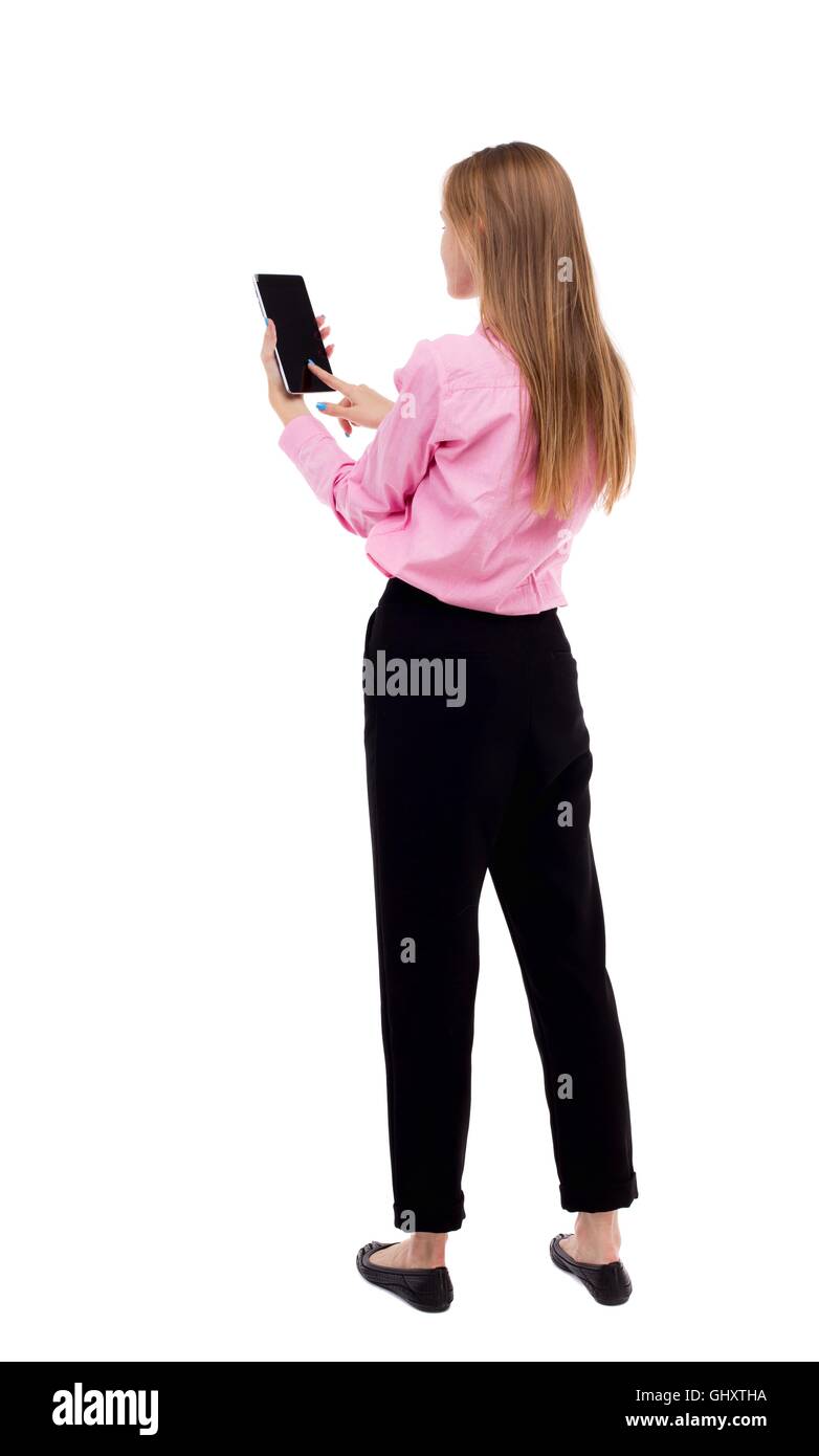 back view of standing young beautiful girl with tablet computer Stock ...