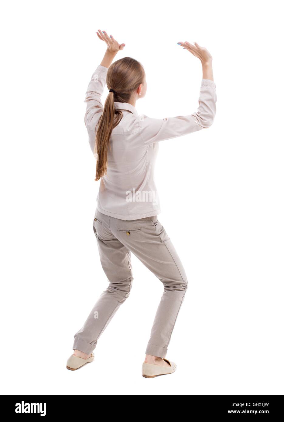 Rear view female falling Cut Out Stock Images & Pictures - Alamy
