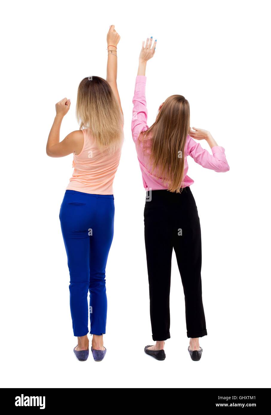 Back view of two young women dancing Stock Photo - Alamy