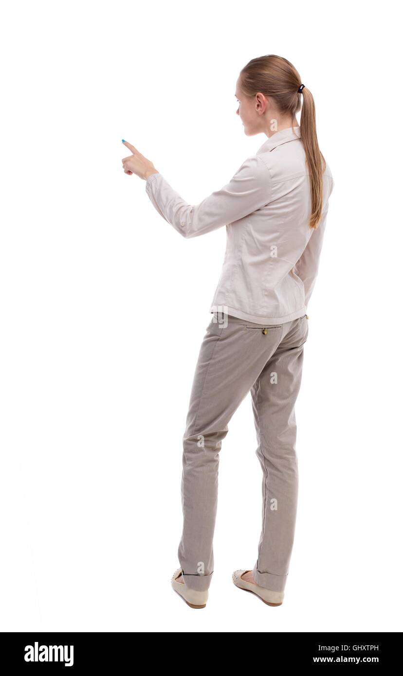 Back view of pointing woman Stock Photo - Alamy