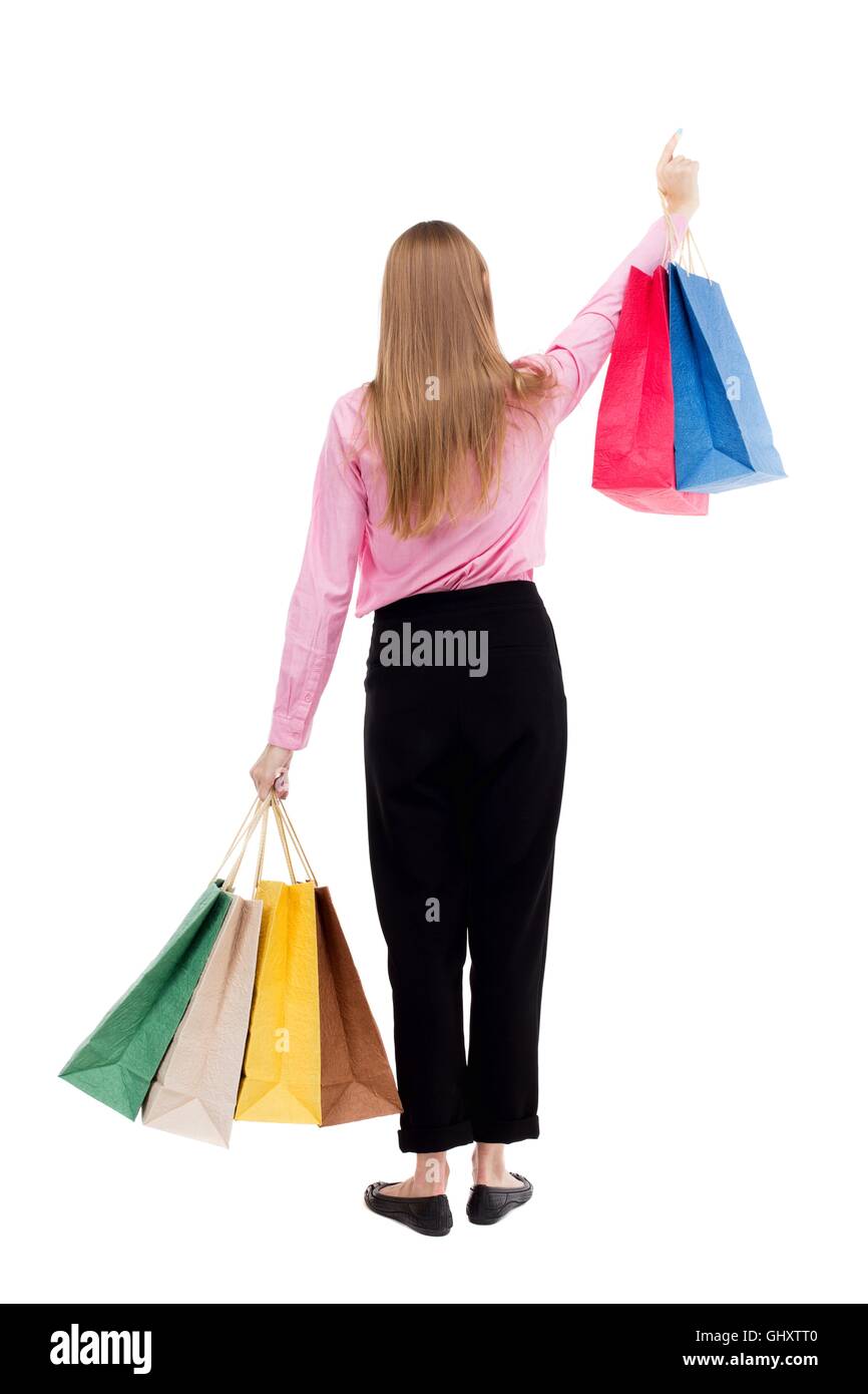 back view of woman with shopping bags Stock Photo - Alamy