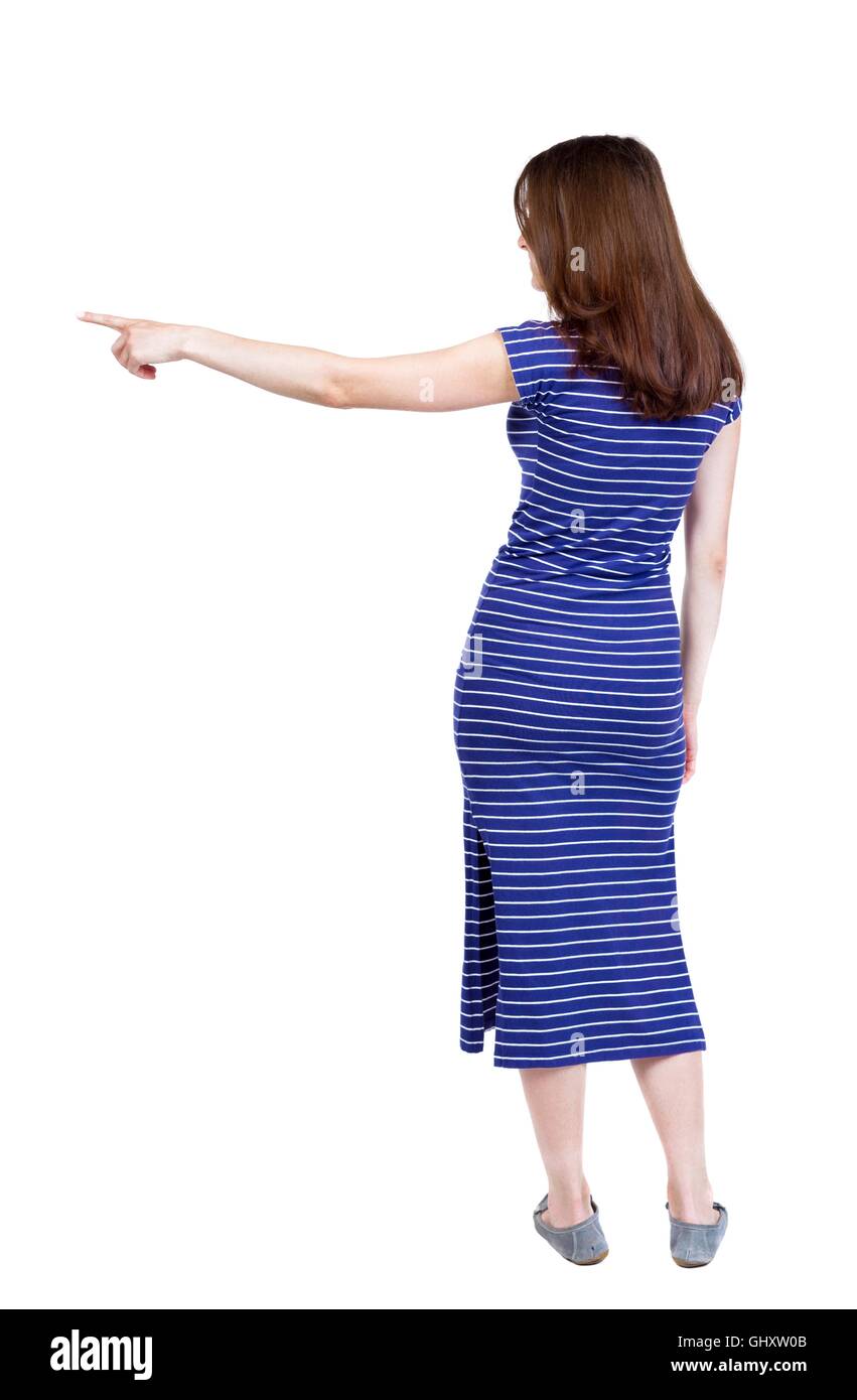 Back view of pointing woman Stock Photo - Alamy
