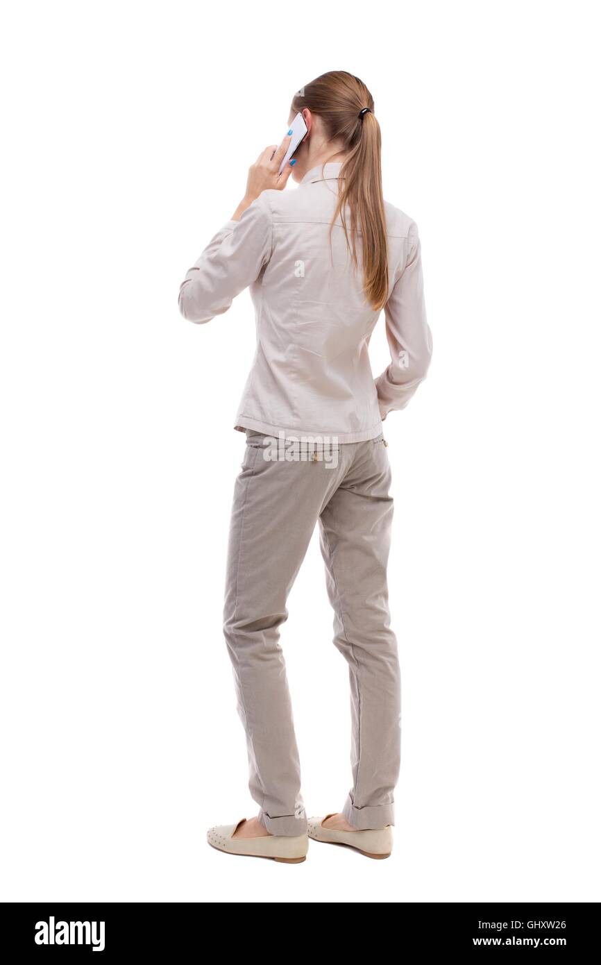 back view of woman talking on phone Stock Photo - Alamy