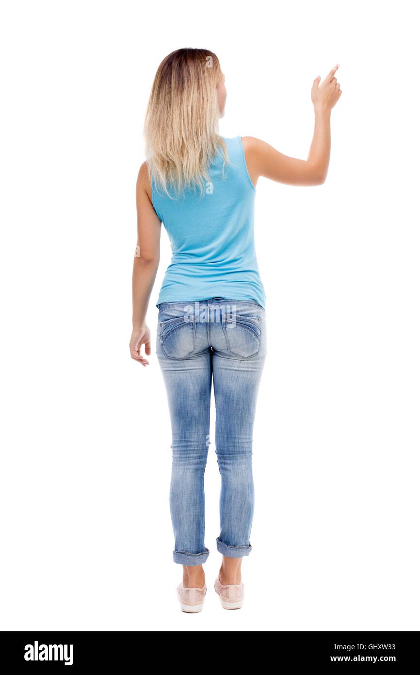 Back view of pointing woman Stock Photo - Alamy