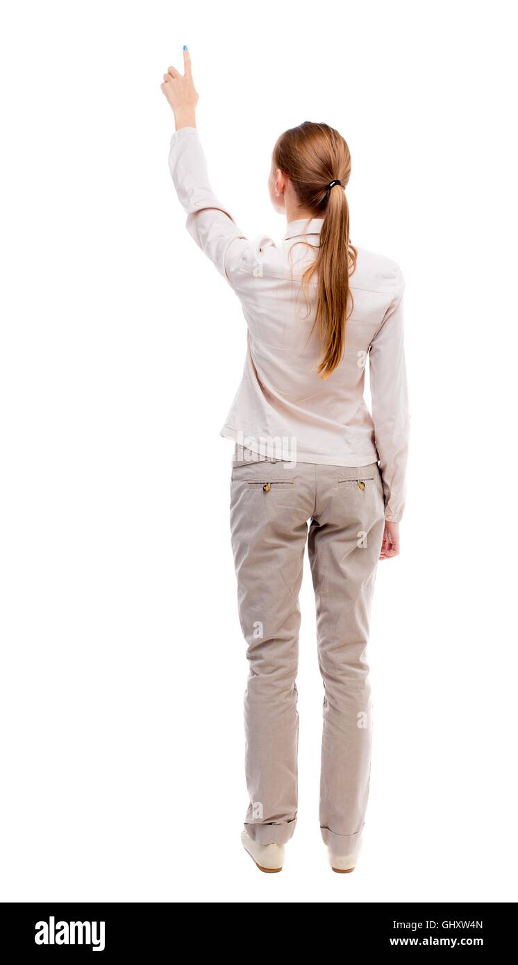 Back view of pointing woman Stock Photo - Alamy