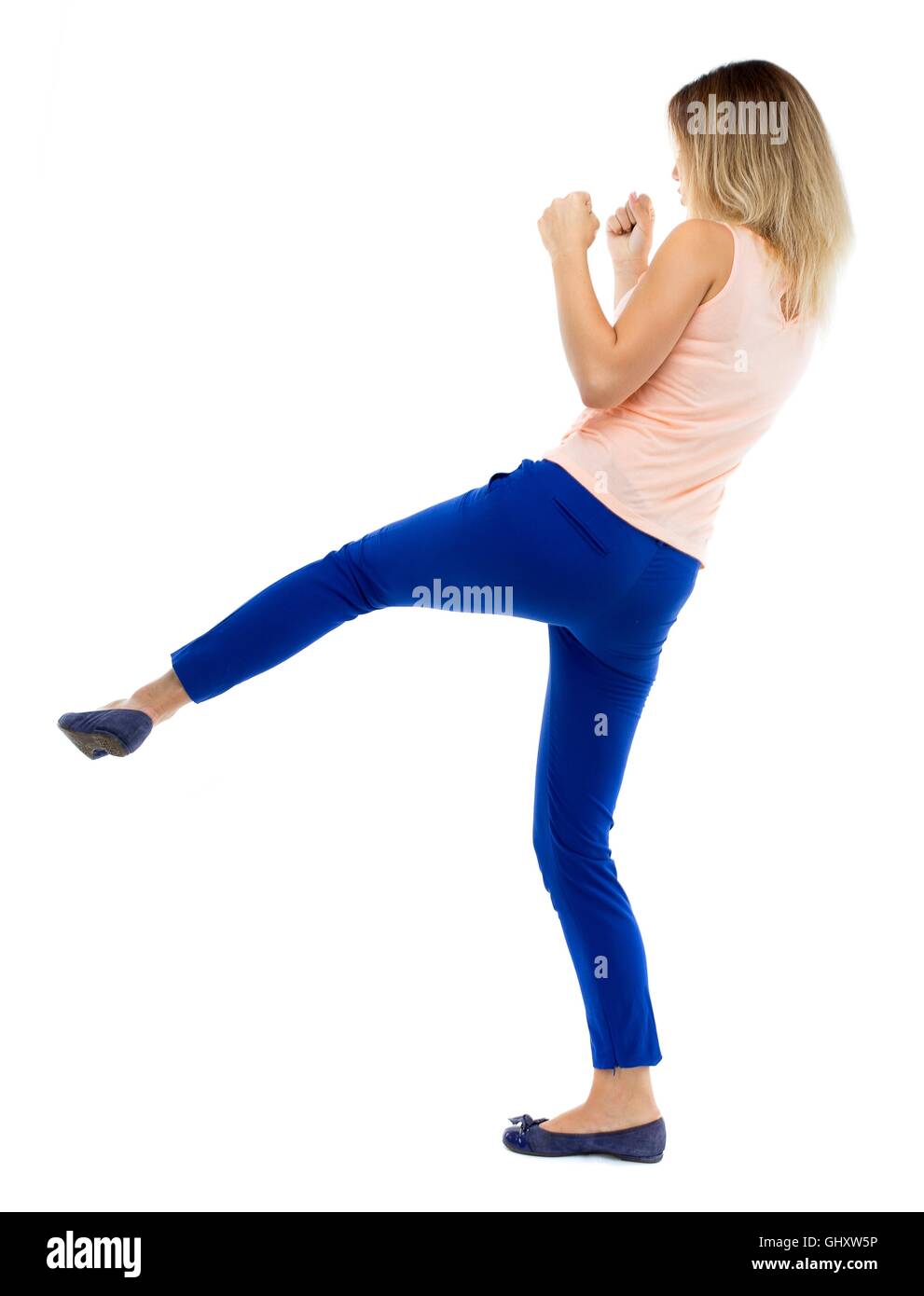skinny woman funny fights waving his arms and legs Stock Photo - Alamy