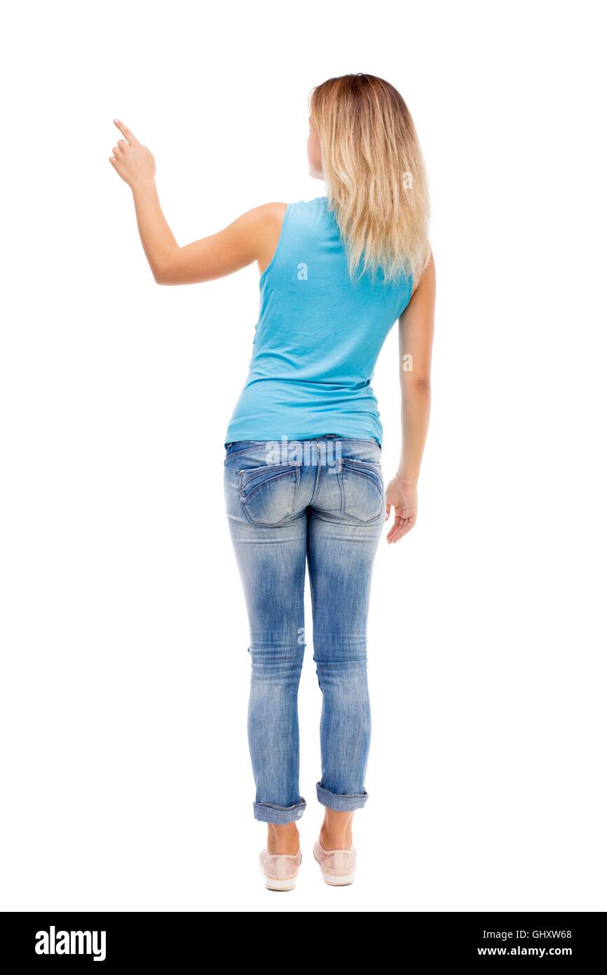 Back view of pointing woman Stock Photo - Alamy