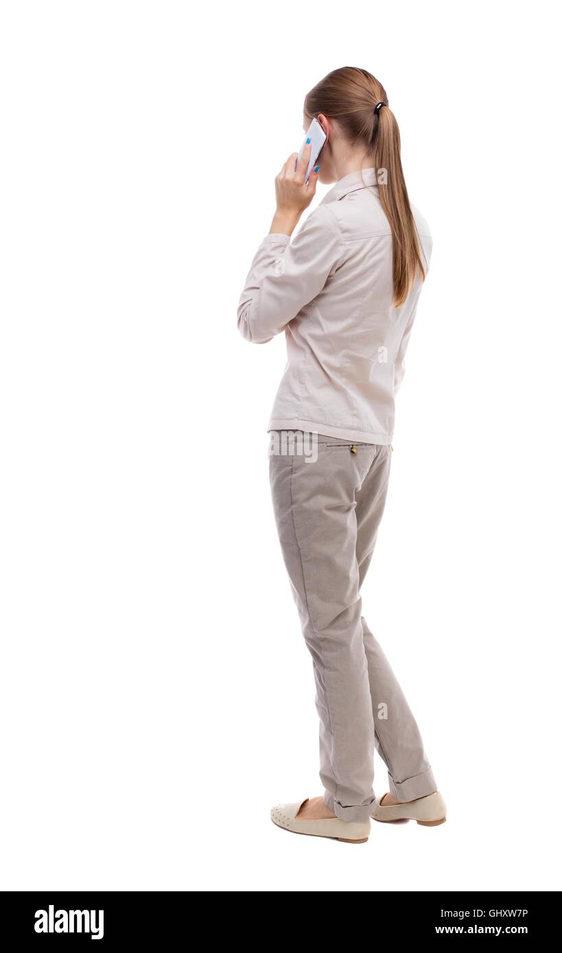 Talk on phone rear view Cut Out Stock Images & Pictures - Alamy