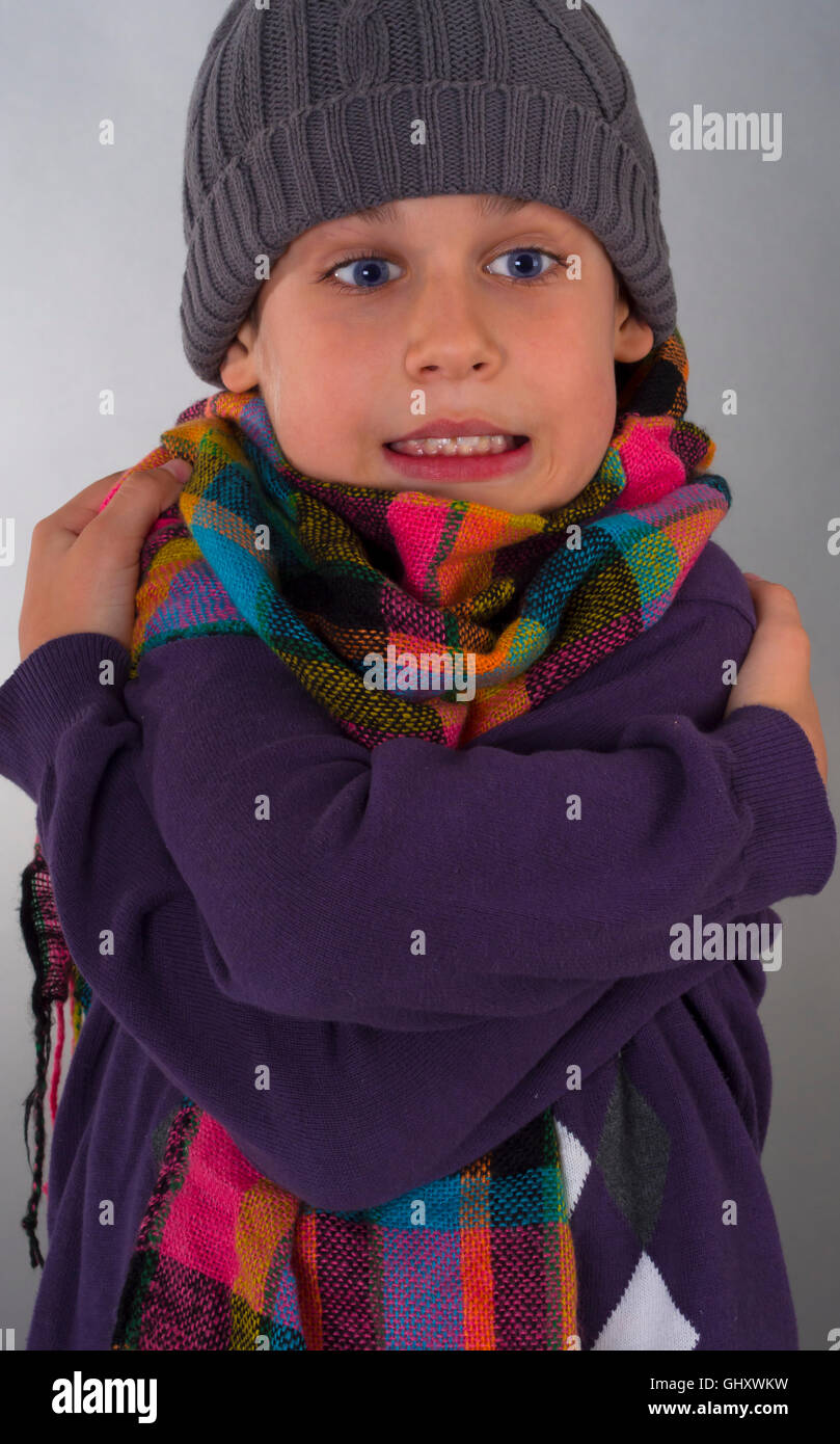 boy in the winter clothes, cold, ill Stock Photo - Alamy