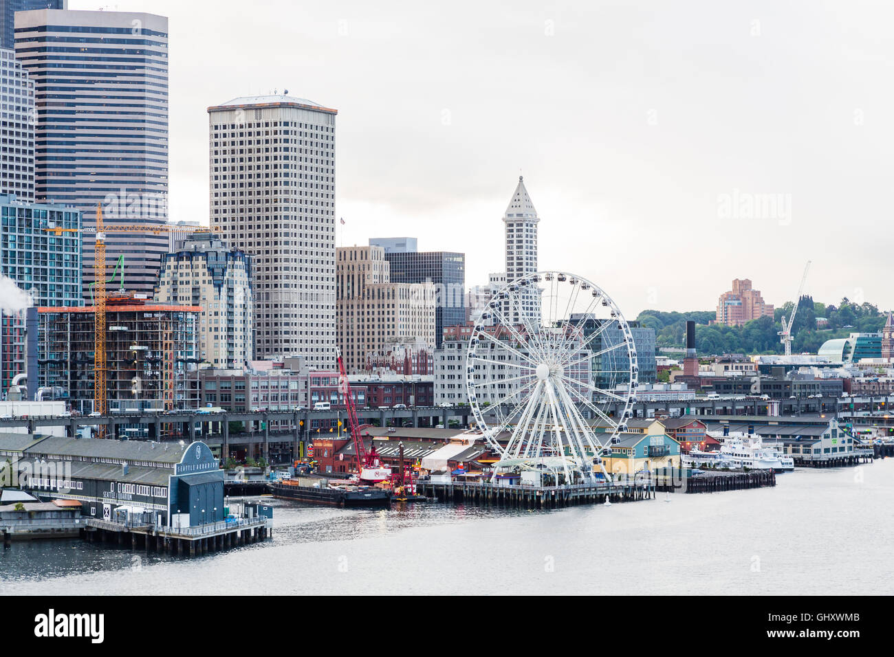 Waterfront architecture of Seattle featuing the new ferris wheel Stock ...