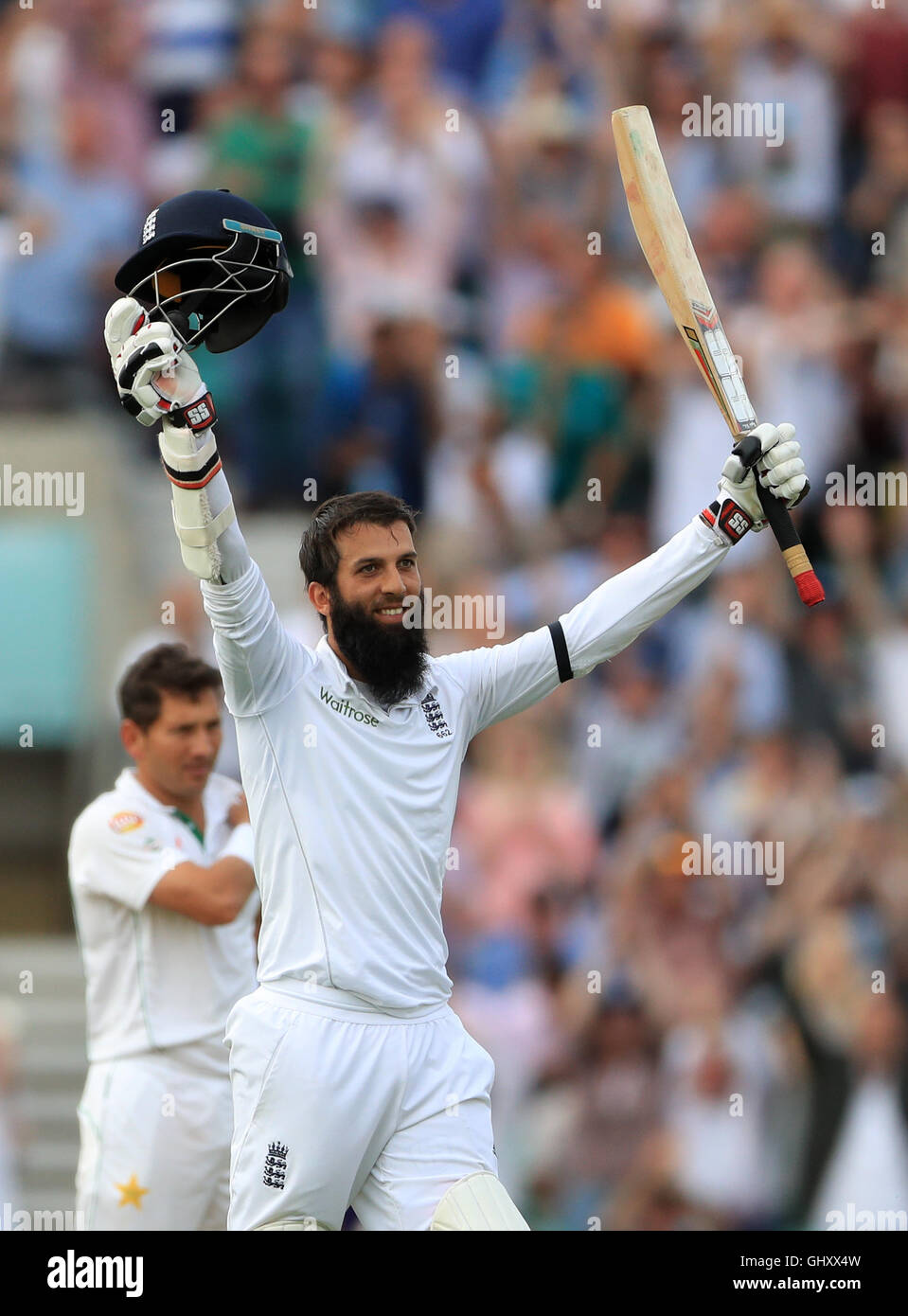 England's Moeen Ali celebrates reaching his century during day one of ...
