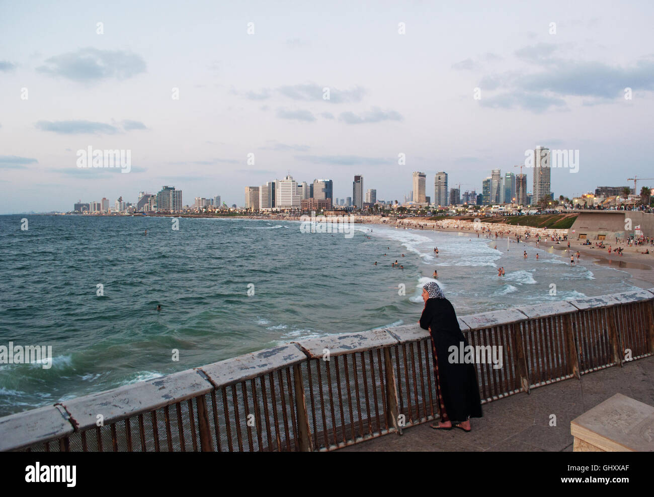 Israel, Middle East: a muslim woman at the promenade of Jaffa after the ...