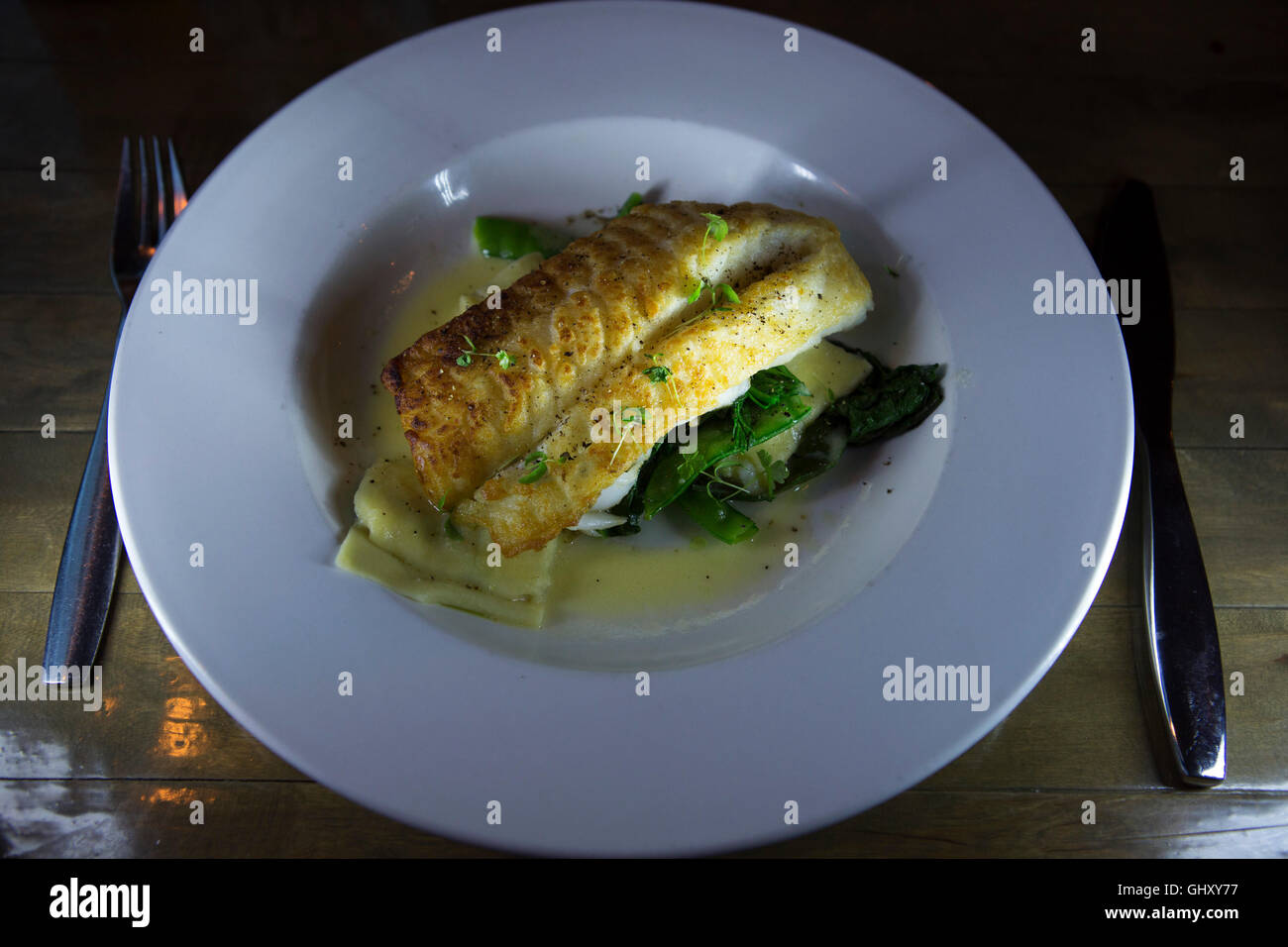 A cod fillet is served in Newfoundland and Labrador, Canada. The fish ...