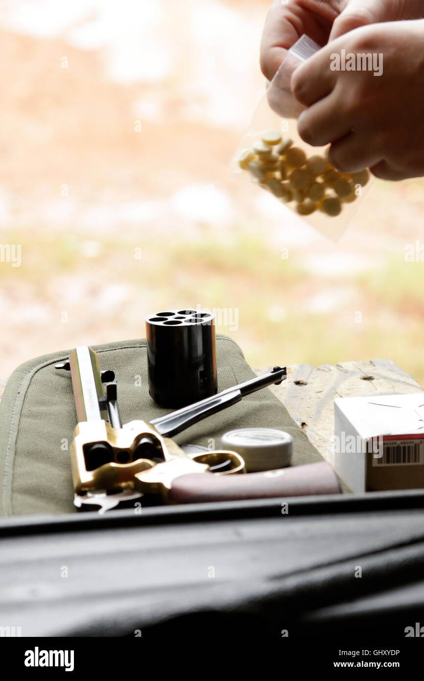 Man loading black powder pistol at Leeds Range in South Carolina Stock ...
