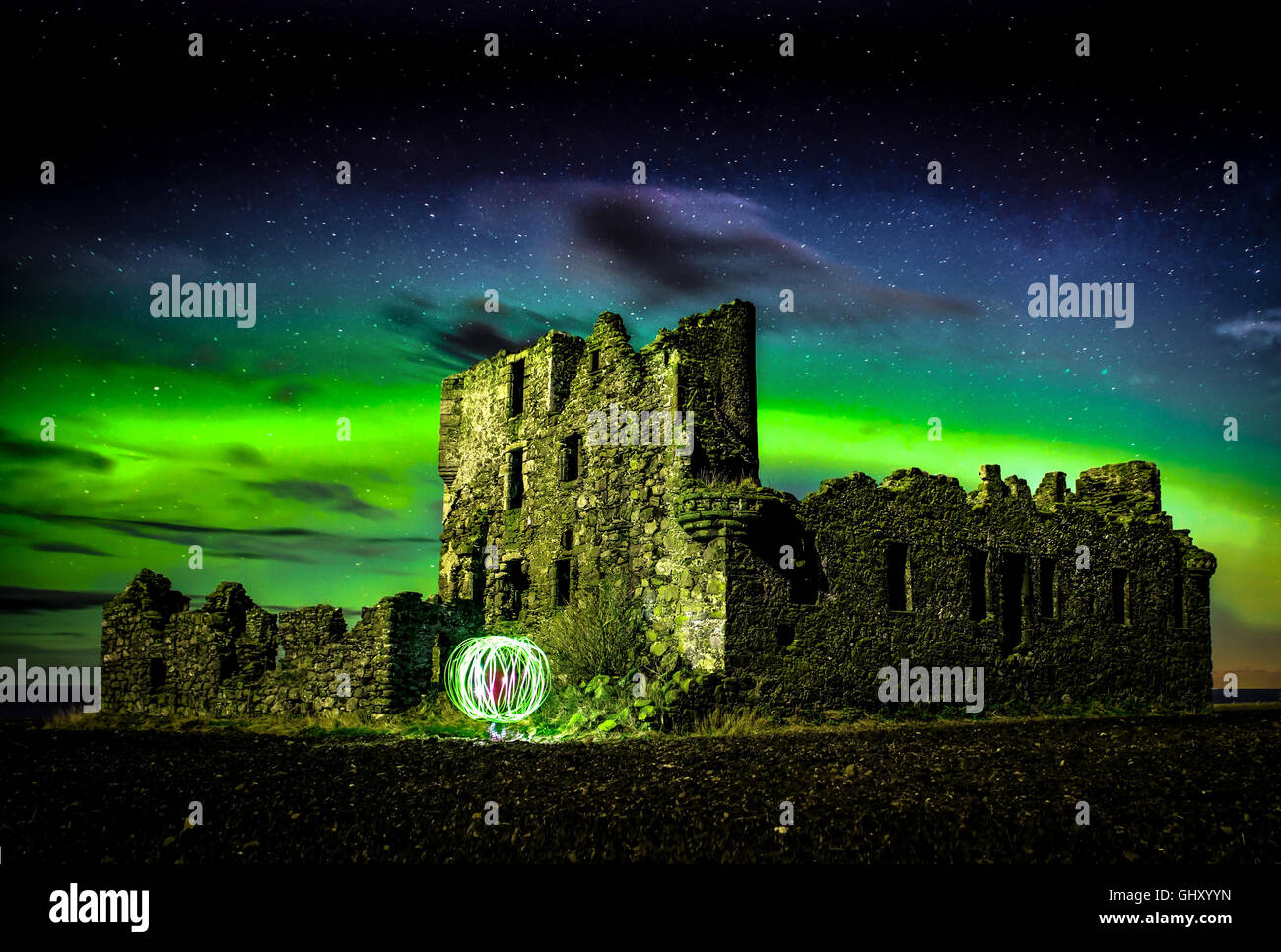 Northern Lights over a Scottish castle ruin Stock Photo - Alamy