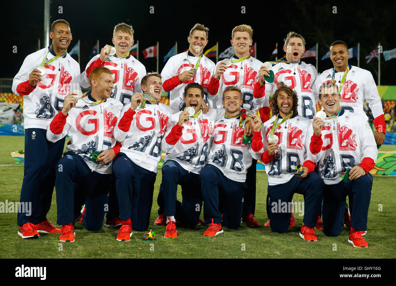 Players from Great Britain with their silver medals after finishing ...