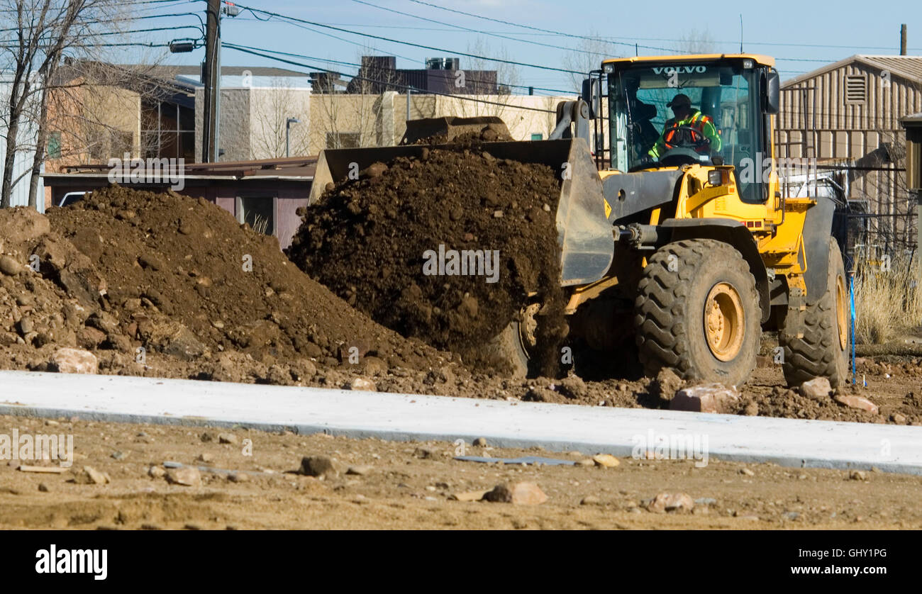 Front loader moves dirt an new subdivision in North Boulder Stock Photo ...