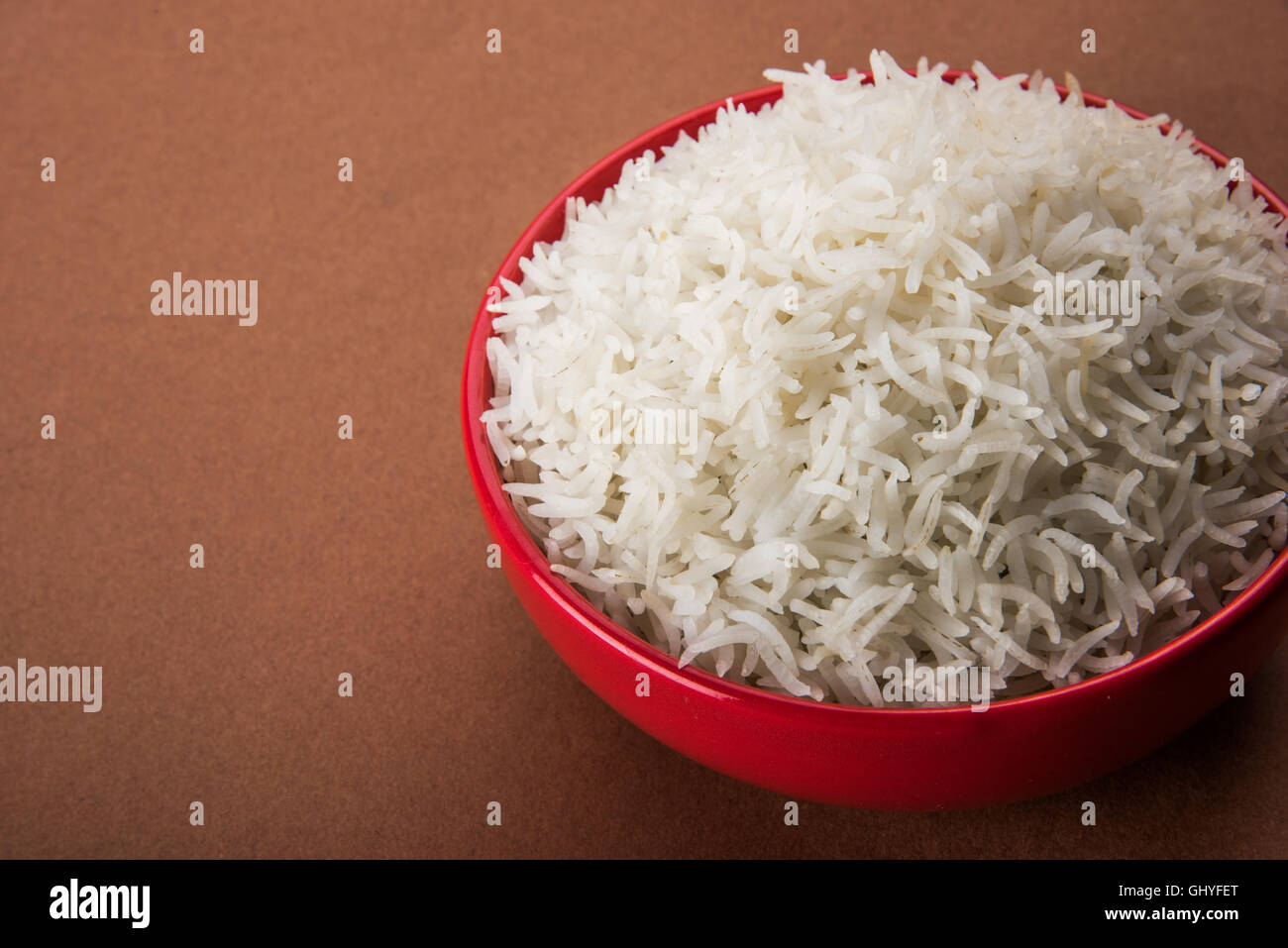 basmati rice in a brass bowl, cooked basmati rice, cooked plain rice ...