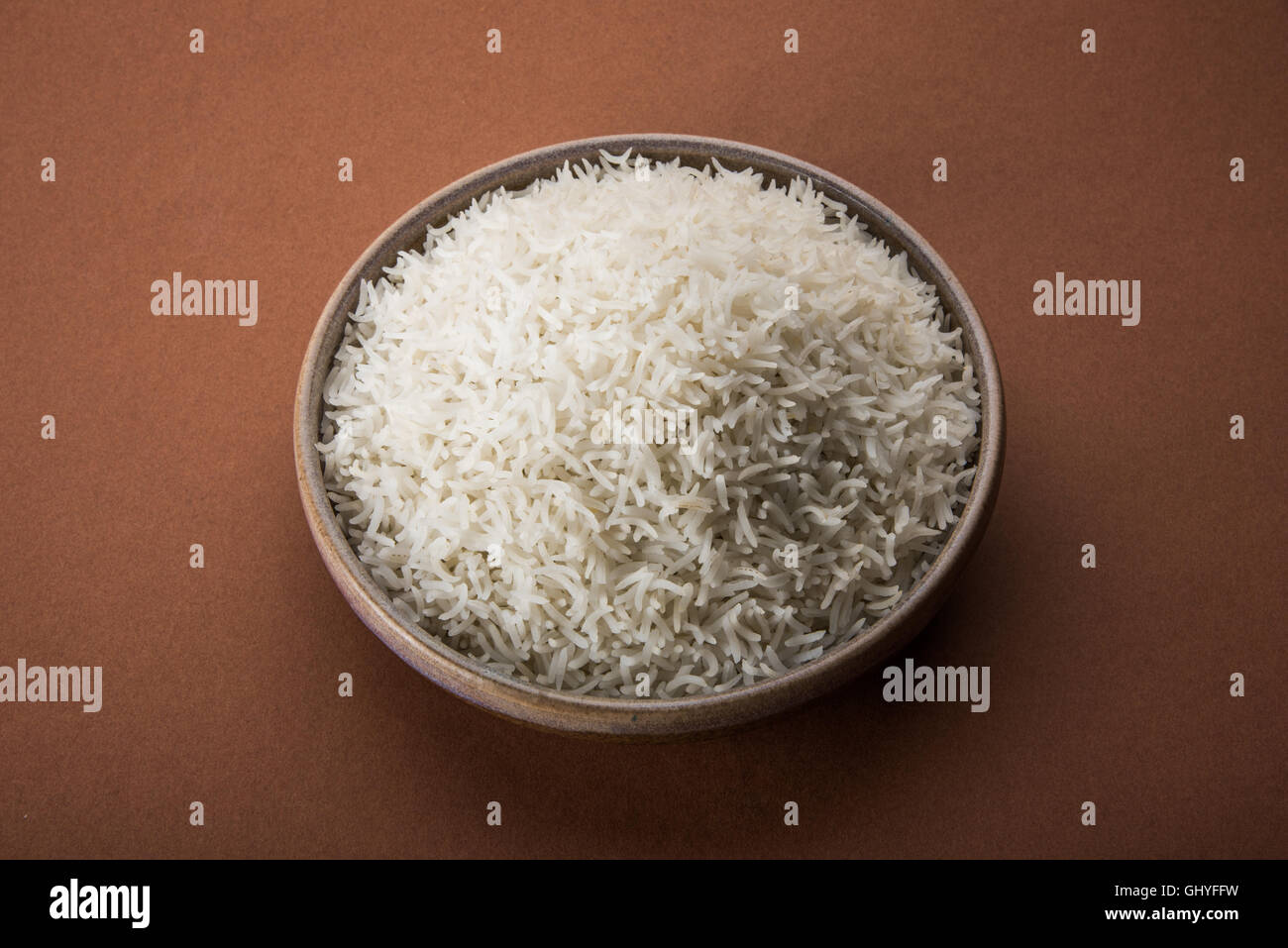 basmati rice in a brass bowl, cooked basmati rice, cooked plain rice ...