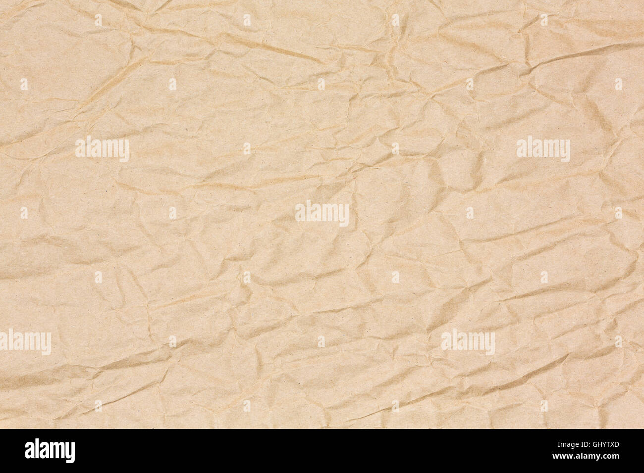 Crinkled brown recycled paper background Stock Photo - Alamy