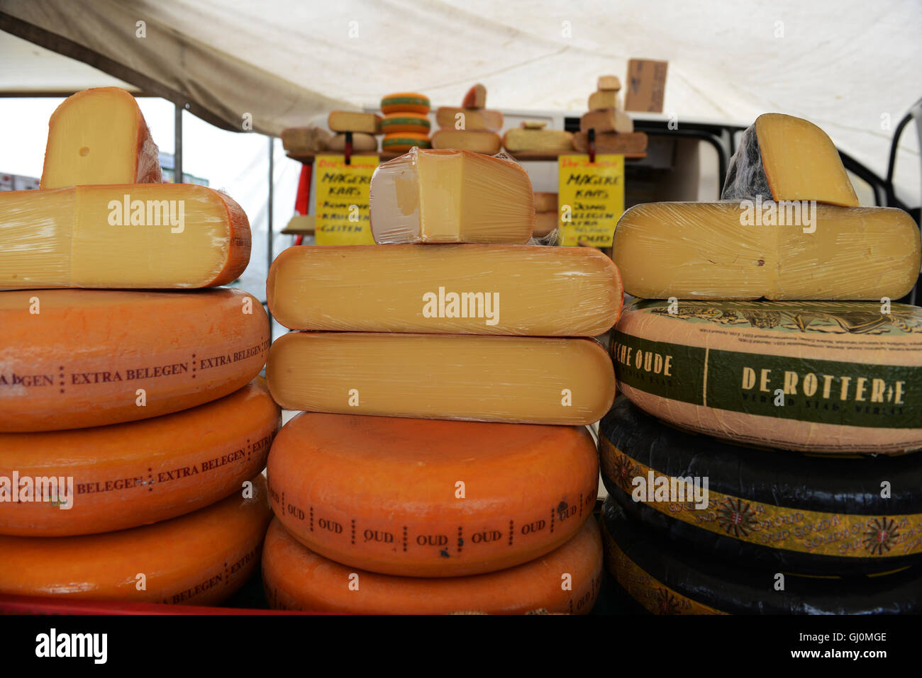 Dutch cheeses on display at the colorful outdoor market in Rotterdam ...