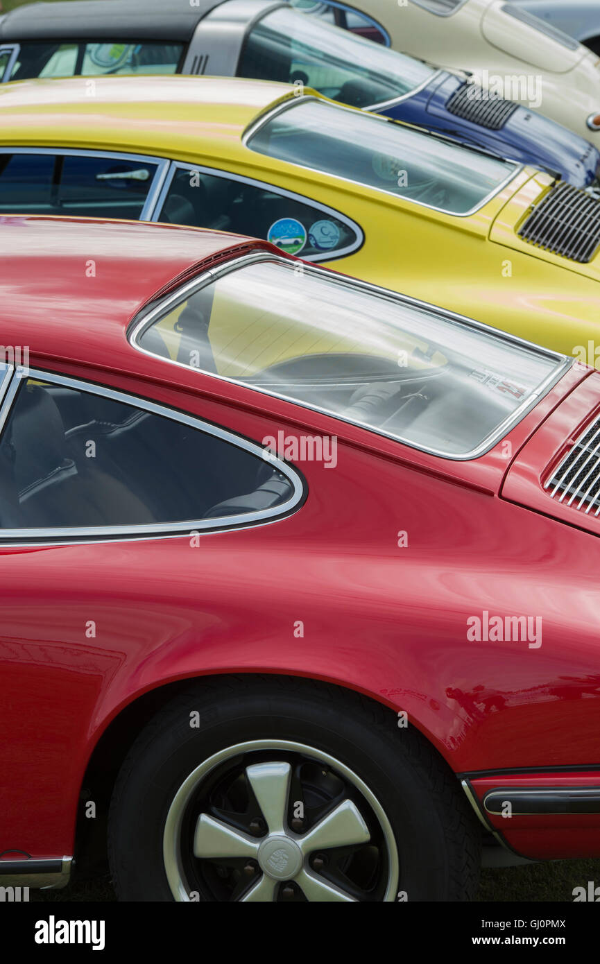 Porsche 911 cars in a line abstract Stock Photo - Alamy