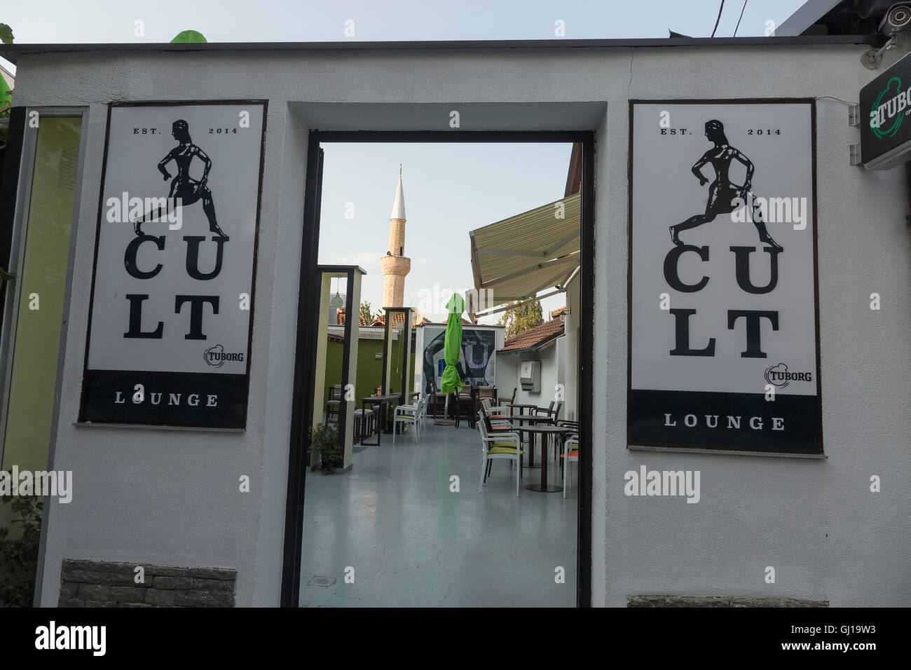 Minaret of Bajraki Mosque through Cult bar Stock Photo - Alamy