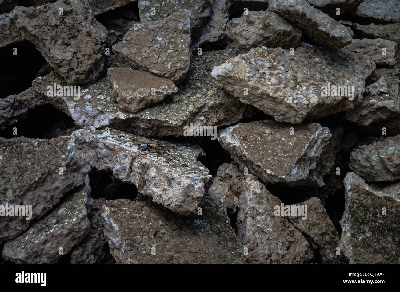 Close focus a pile of destroyed concrete in low light effect Stock ...