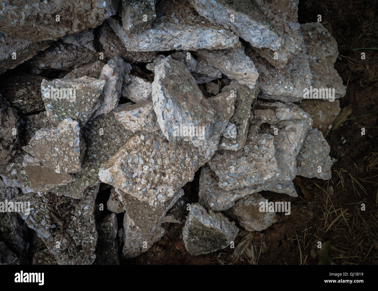 Close focus a pile of destroyed concrete in low light effect Stock ...