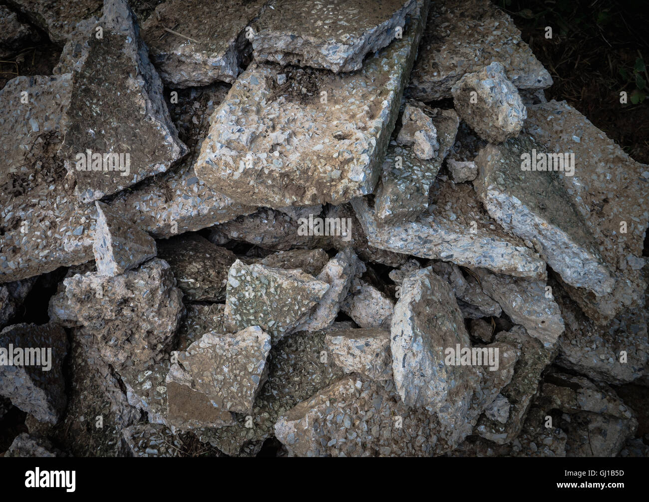 Close focus a pile of destroyed concrete in low light effect Stock ...