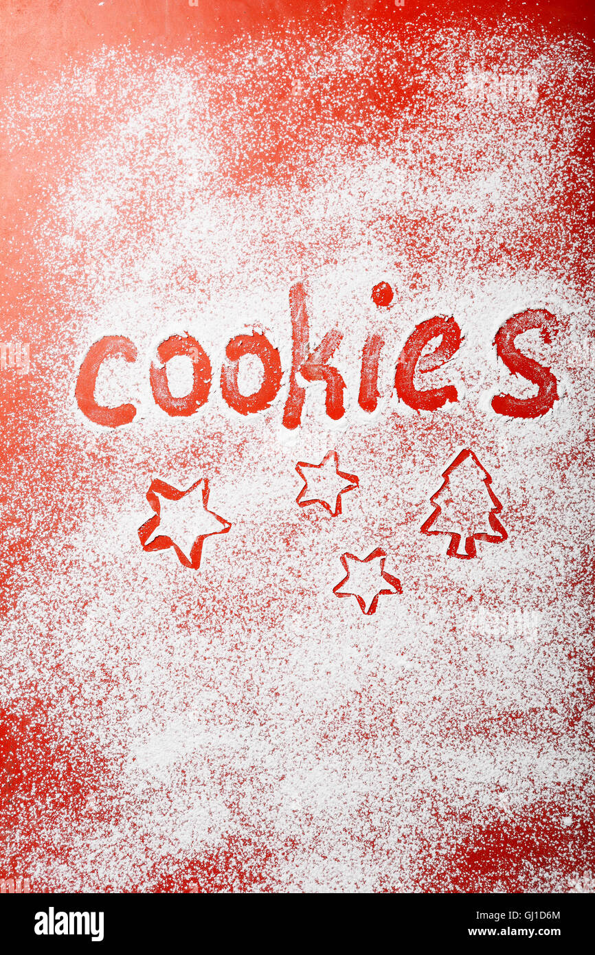 Red christmas baking background with flour and stars Stock Photo - Alamy