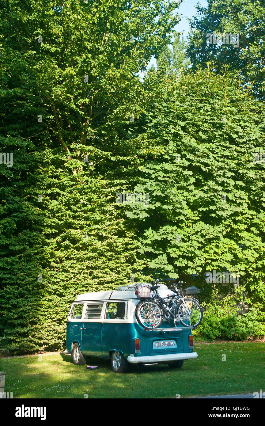 Green travel camper van driving hi-res stock photography and images - Alamy