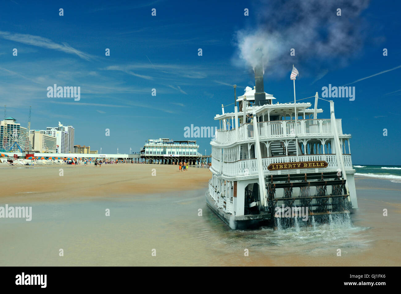 Composite image of paddlewheel steamboat (paddle steamer) churning ...