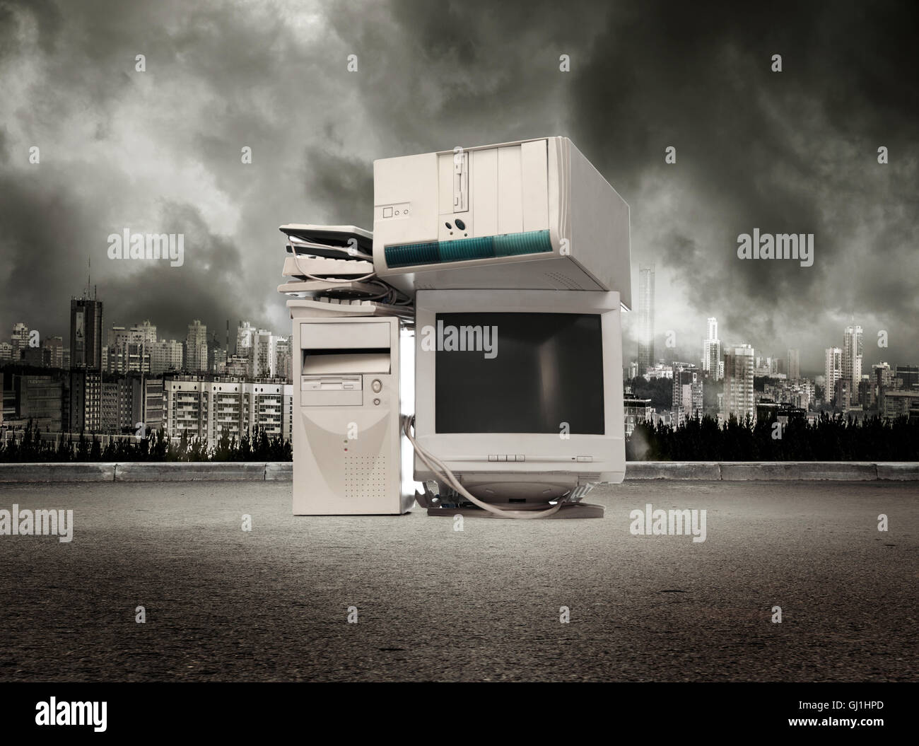 Computer on view of city in stormy sky background Stock Photo - Alamy