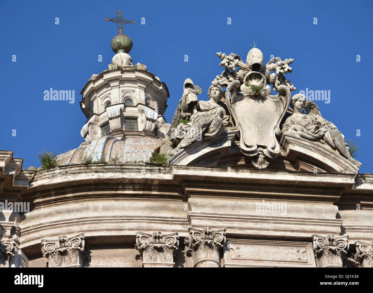 Baroque dome and Pope emblem at the top of Ss Luca and Martina baroque ...