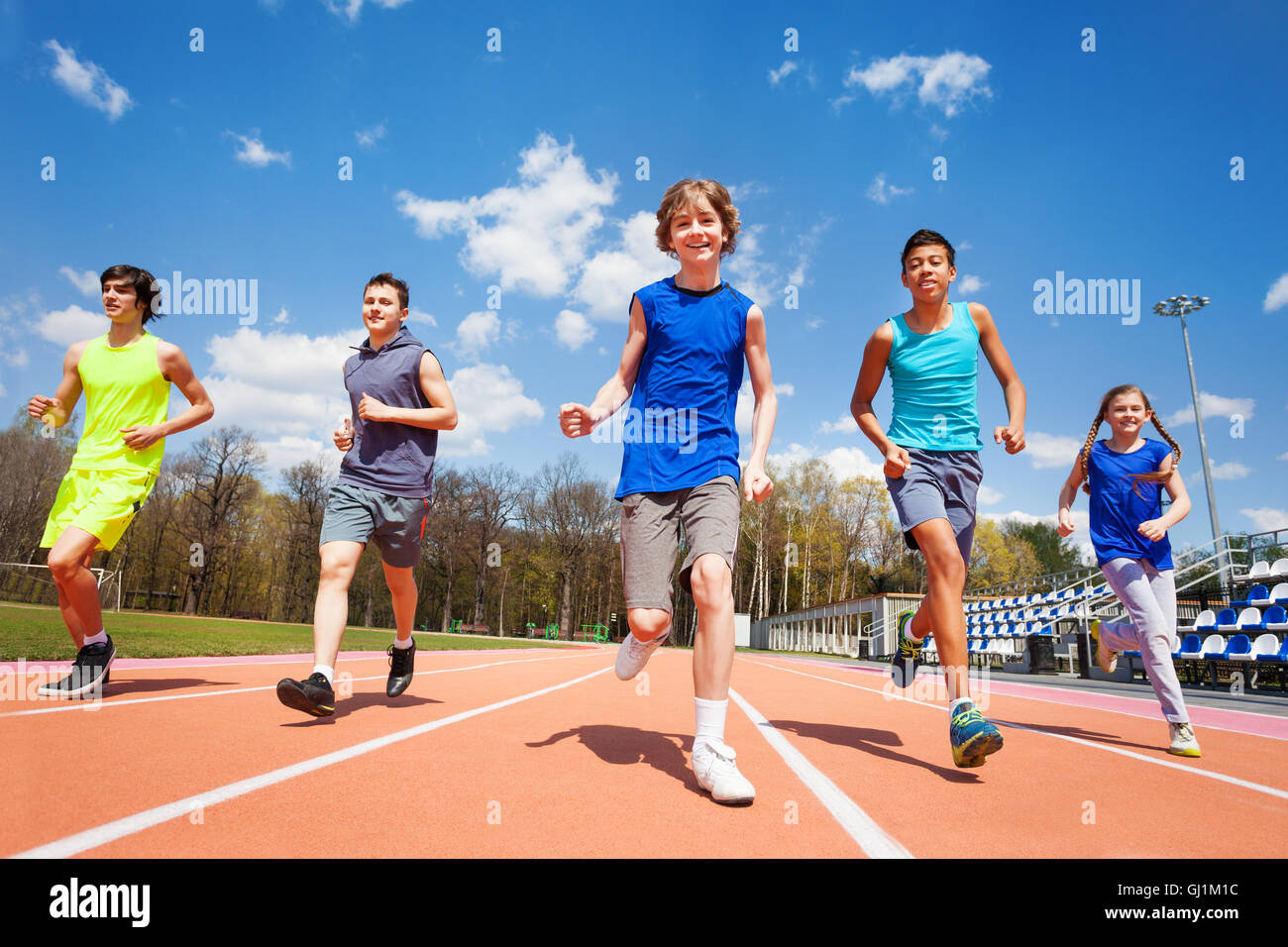 Kids running to class hi-res stock photography and images - Alamy