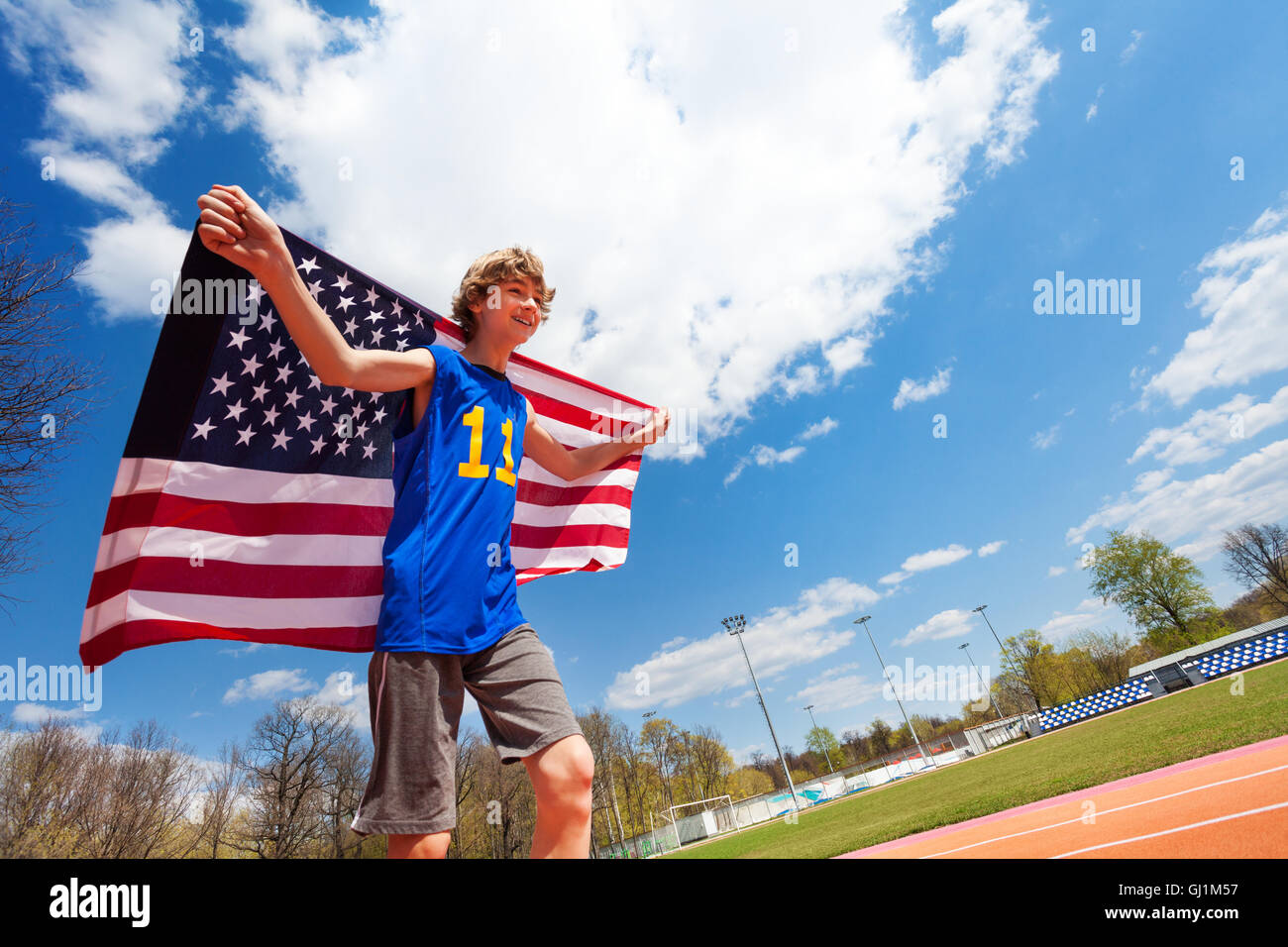 Teen boy running track hi-res stock photography and images - Alamy