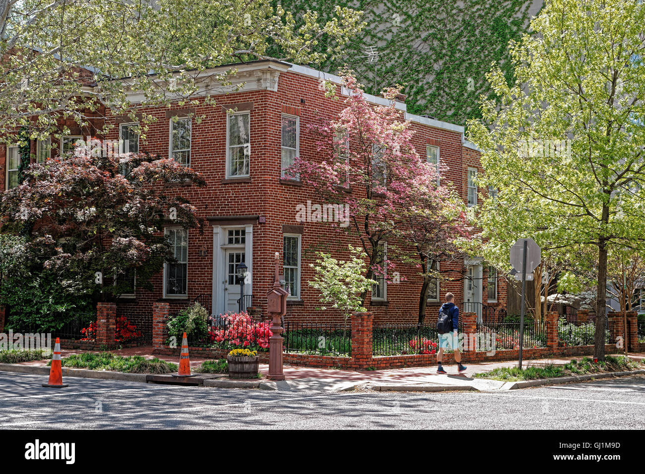 House made of red brick was photographed in Washington D.C., USA. The ...